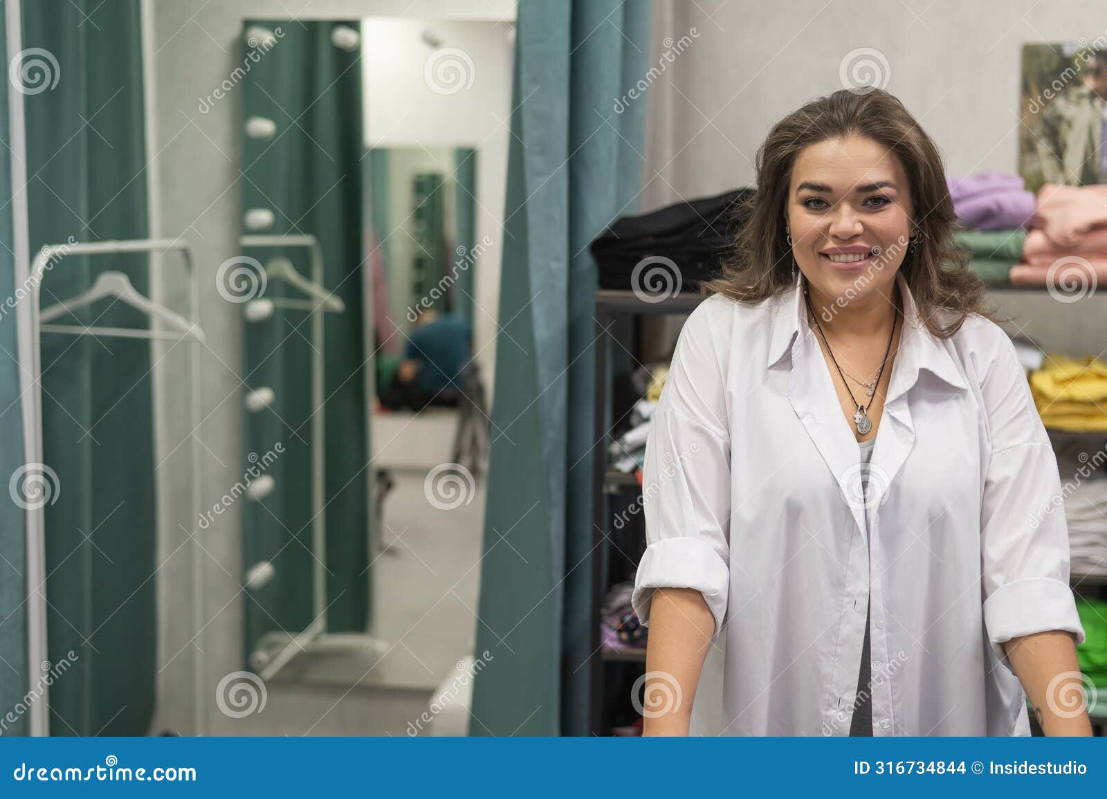 A Fat Woman Chooses Clothes in a Plus Size Store. Stock Photo - Image ...