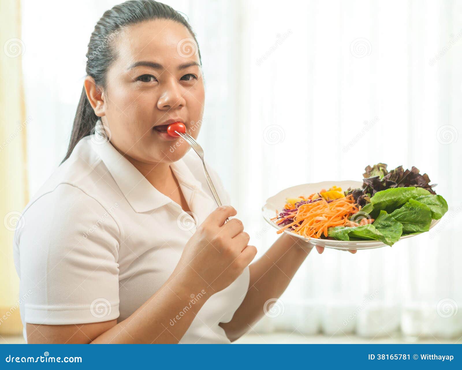 Fat woman eating salad stock image. Image of vegetarian - 38165781