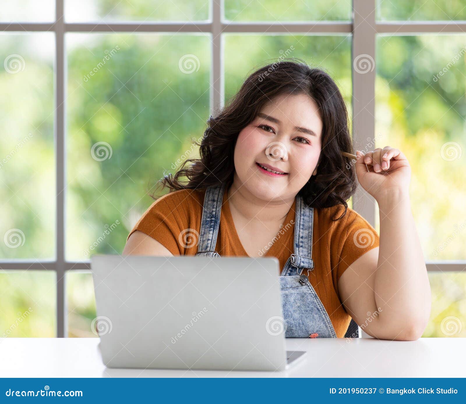 Fat Woman Student with Concentration Sitting and Holding Pen Writing on ...