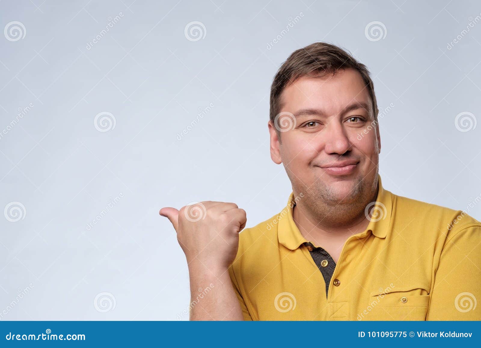 Fat Young Man Making a Gesture Pointing Aside on White Background ...