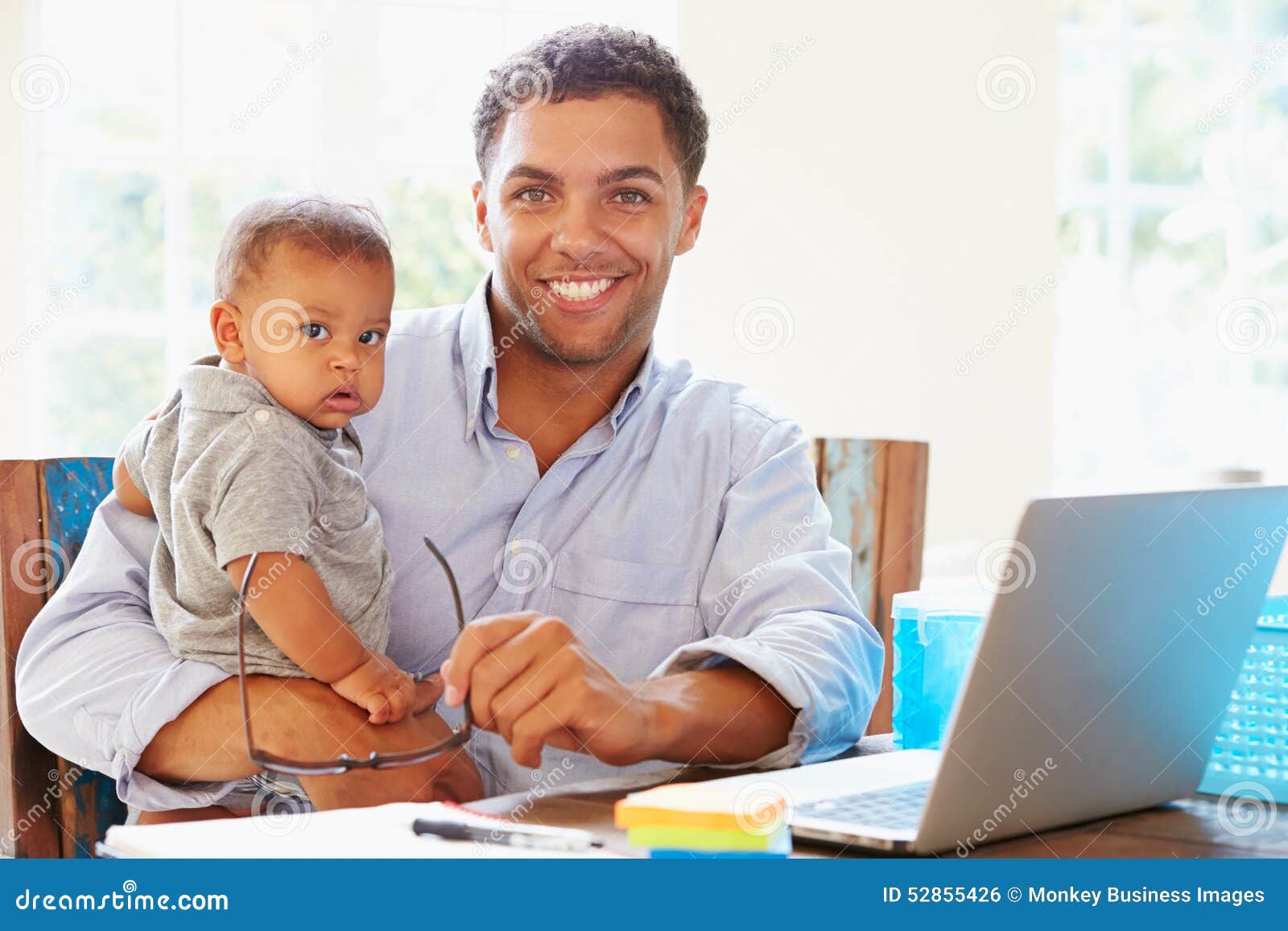 Father with Baby Working in Office at Home Stock Photo - Image of ...