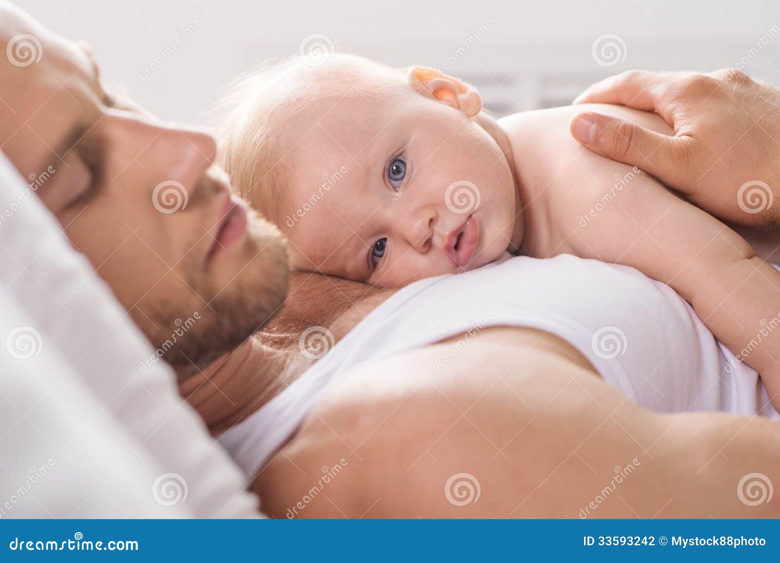 Father and baby. stock photo. Image of small, lying, people - 33593242