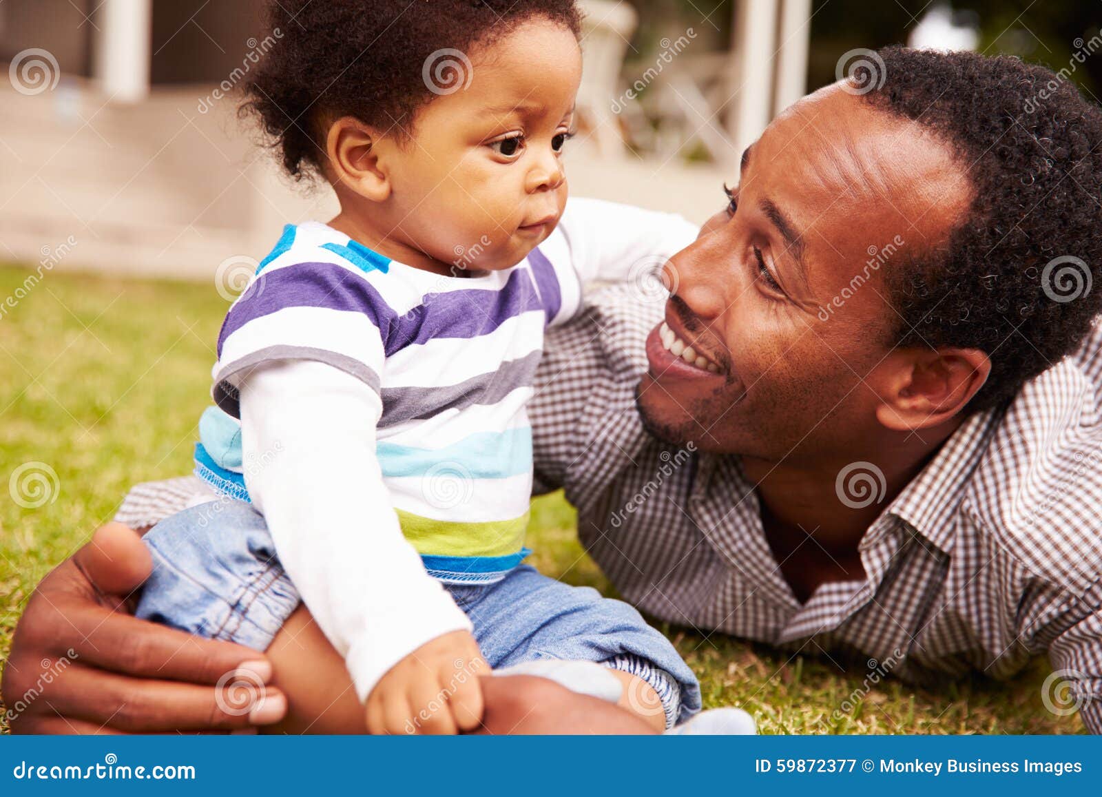 Father Bonding with His Toddler Son in a Garden Stock Image - Image of ...