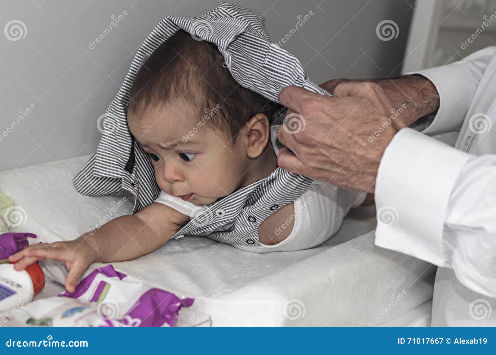 Father Changing and Dressing Up 9 Months Baby Stock Image - Image of ...
