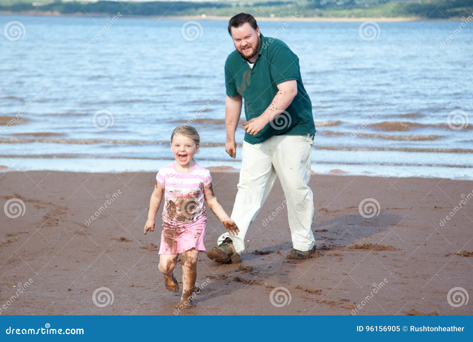Father Chasing Daughter stock image. Image of chase, play - 96156905