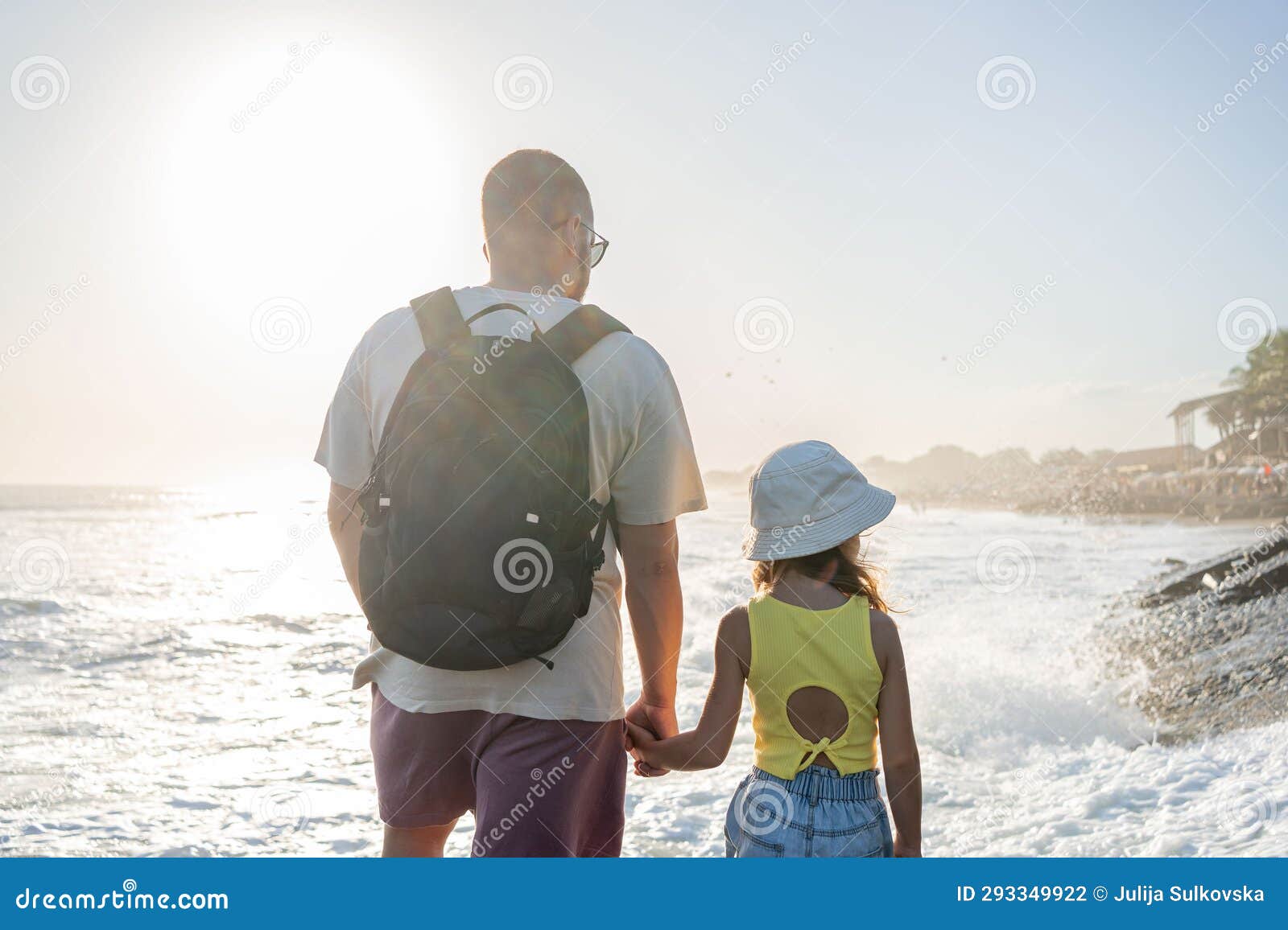 Father with Child Look at the Waves on a Sunny Day. Stock Photo - Image ...