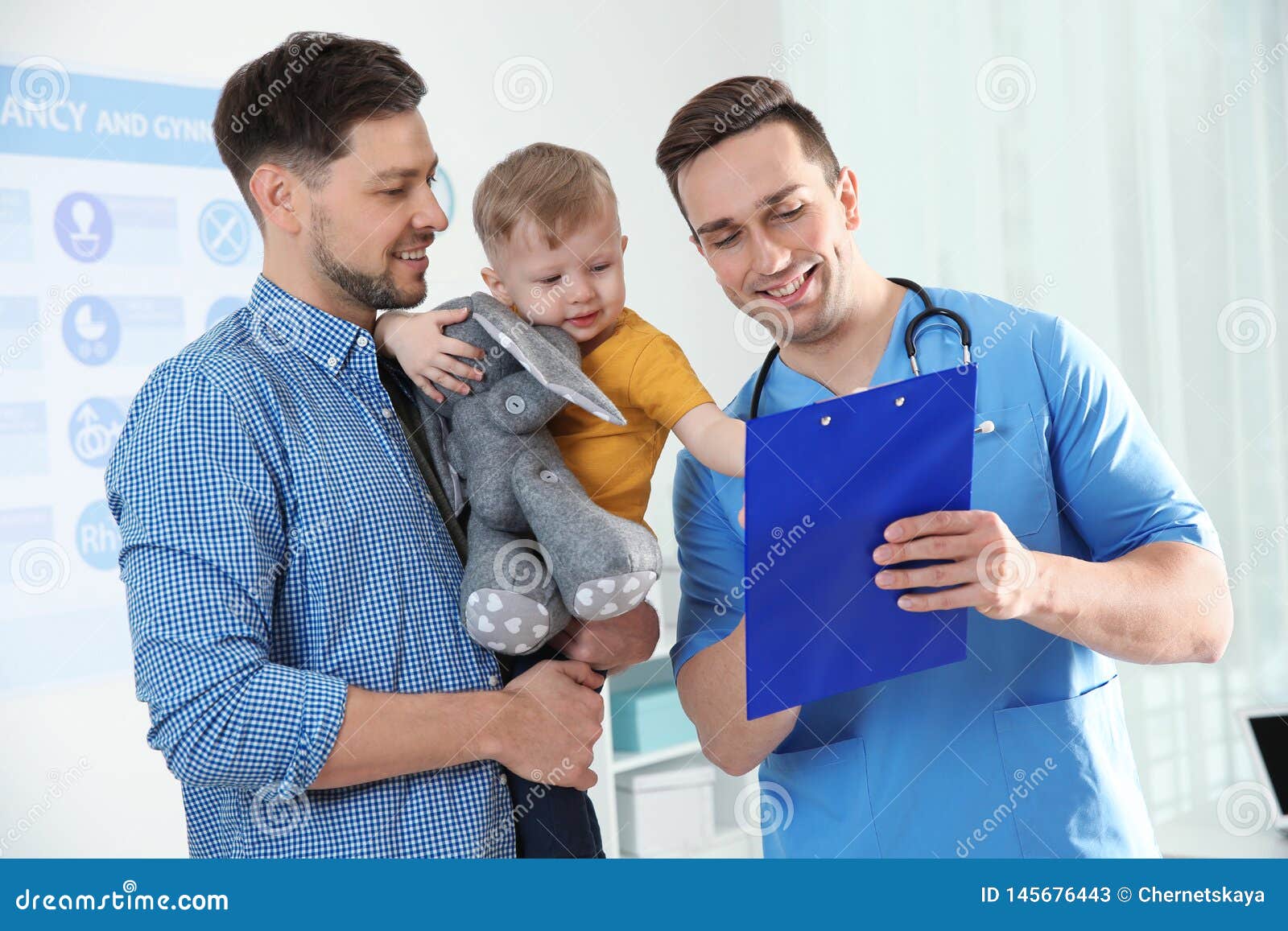 Father with Child Visiting Doctor Stock Image - Image of insurance ...