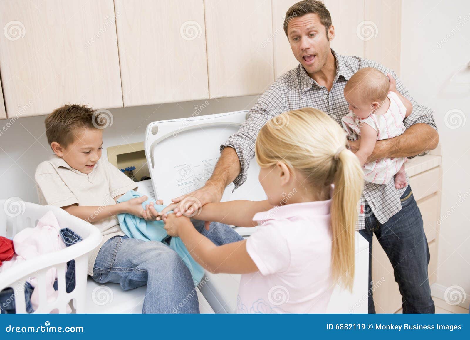 Father and Children Doing Laundry Stock Image - Image of indoors ...