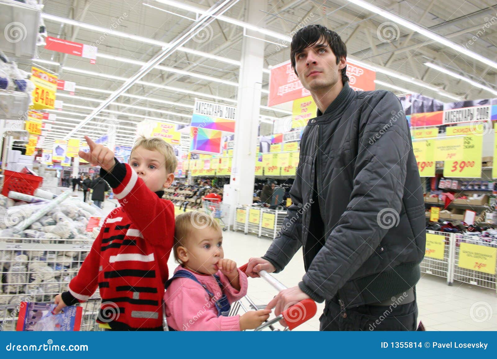 Father with Children in Shop Stock Photo - Image of finger, parent: 1355814