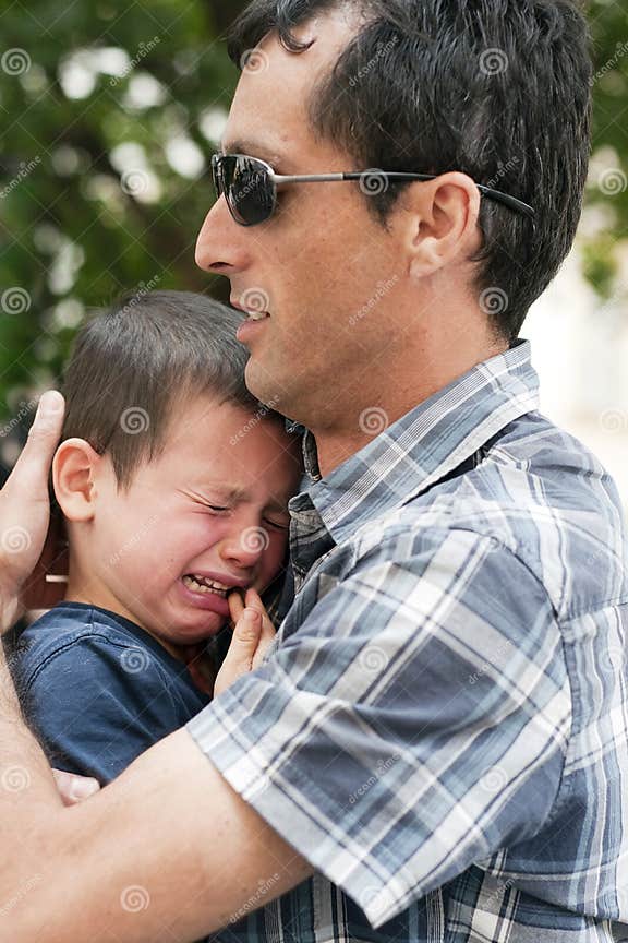 Father with crying child stock photo. Image of family - 26103012
