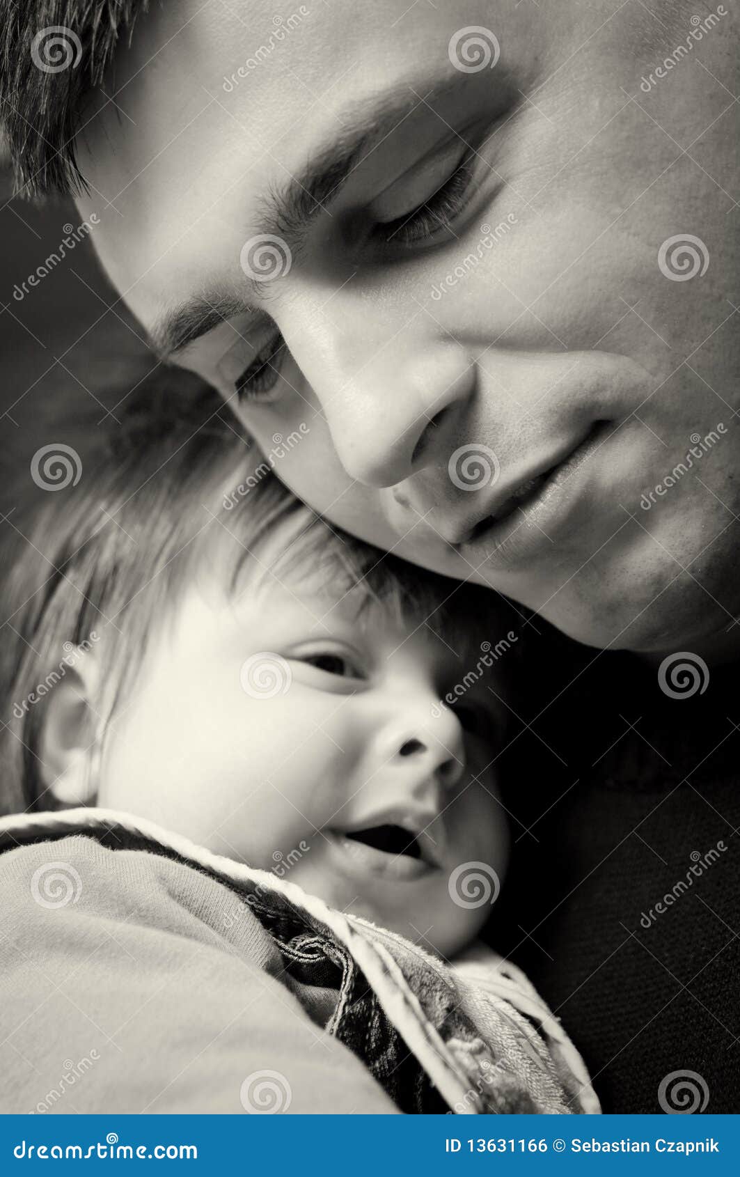 Father cuddling baby son stock photo. Image of baby, portrait - 13631166
