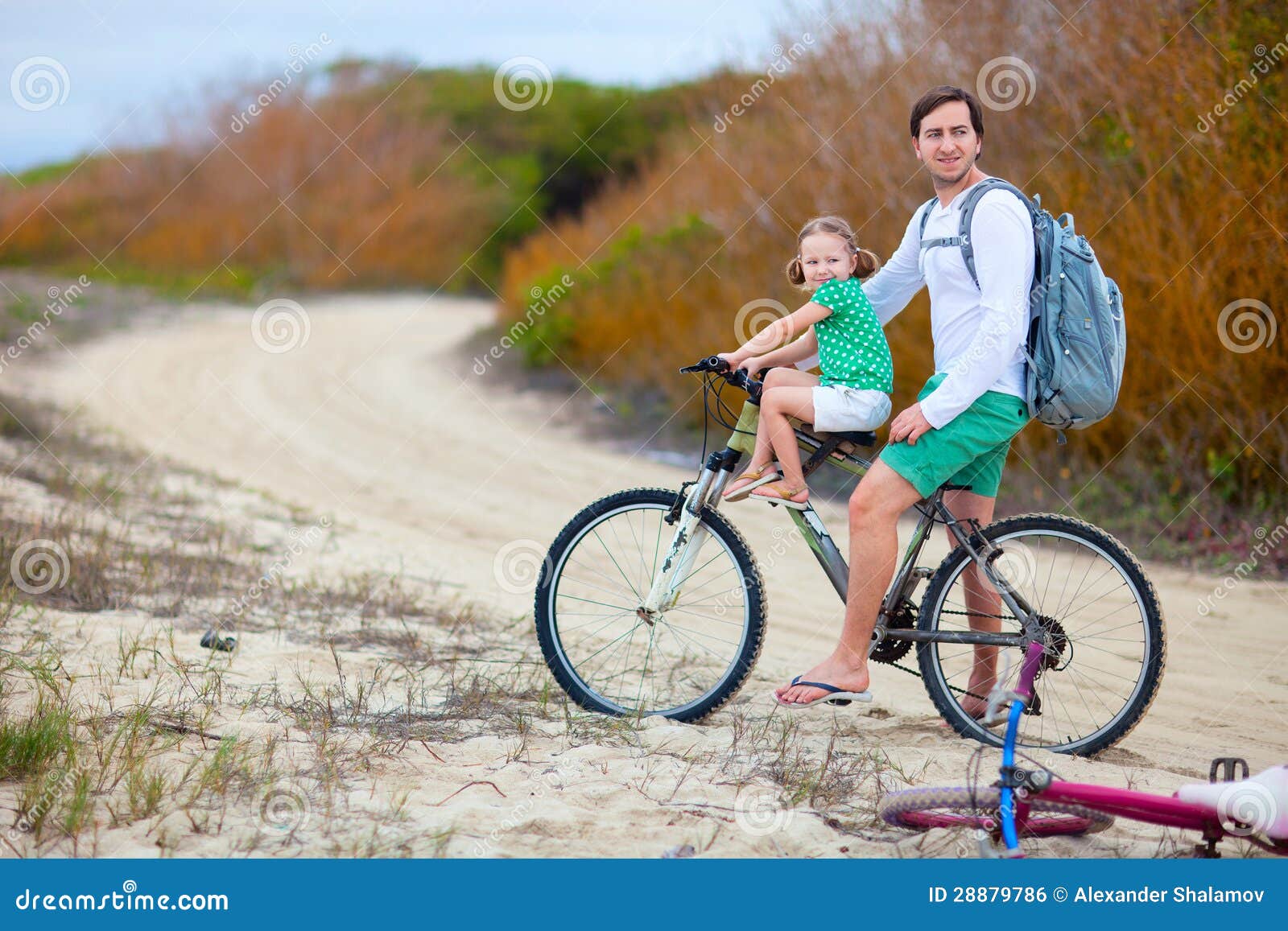 Father and Daughter on a Bike Stock Photo - Image of happy, galapagos ...