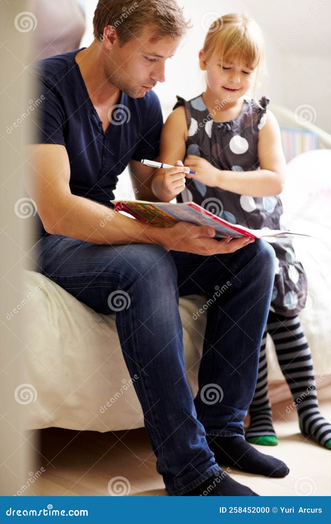 Father-daughter Bonding. a Young Father Bonding with His Little ...