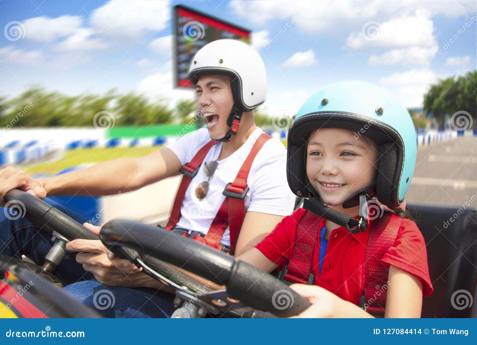 Father and Daughter Driving Go Kart Stock Photo - Image of laughing ...