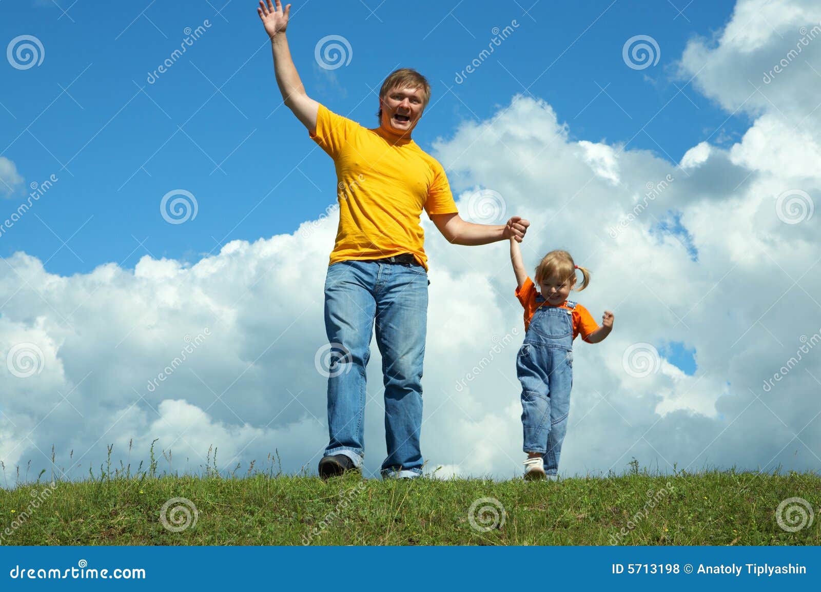 Father with Daughter on Green Grass Stock Photo - Image of white, field ...
