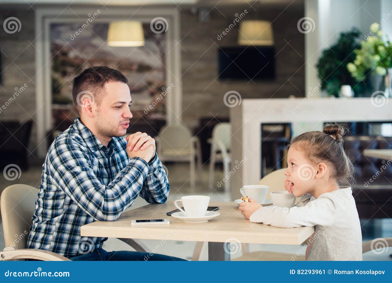 Father and Daughter Having Lunch Together at the Mall Stock Image ...