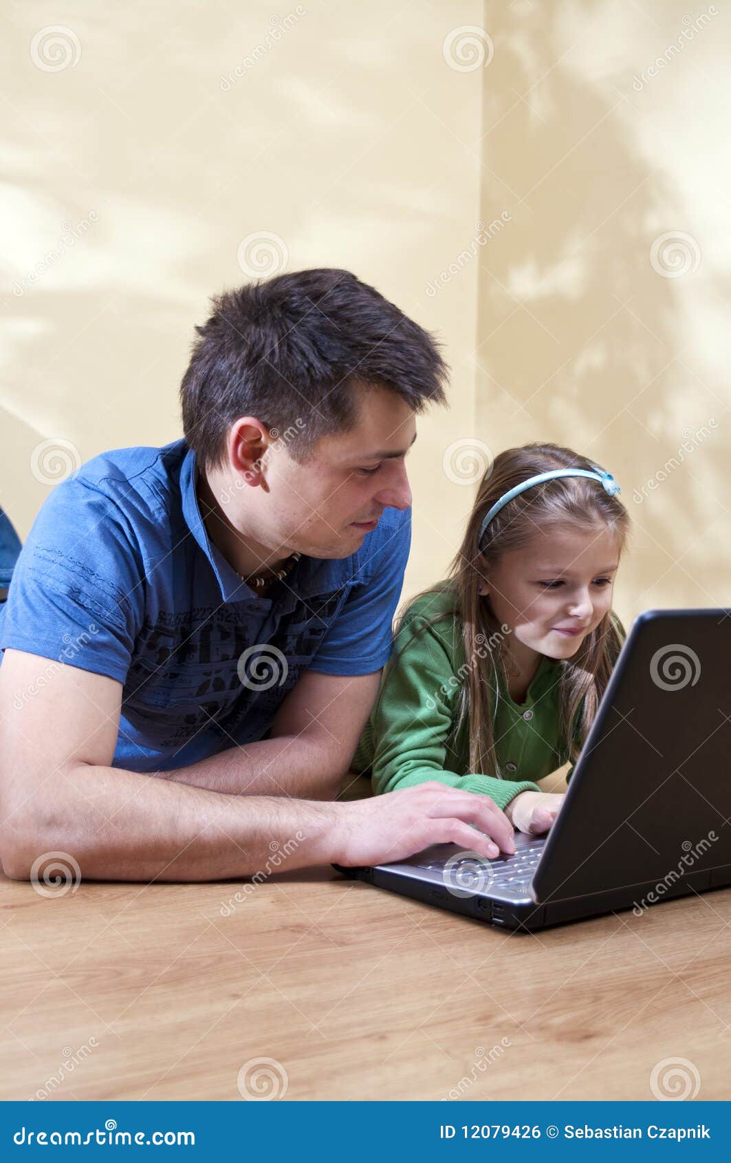 Father and Daughter on Laptop Stock Photo - Image of happy, living ...