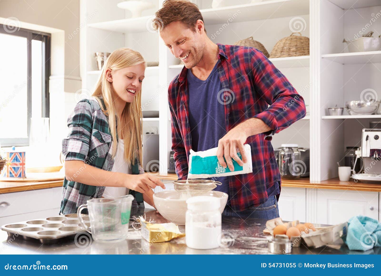 Father and Daughter Making a Cake Together Stock Image - Image of ...
