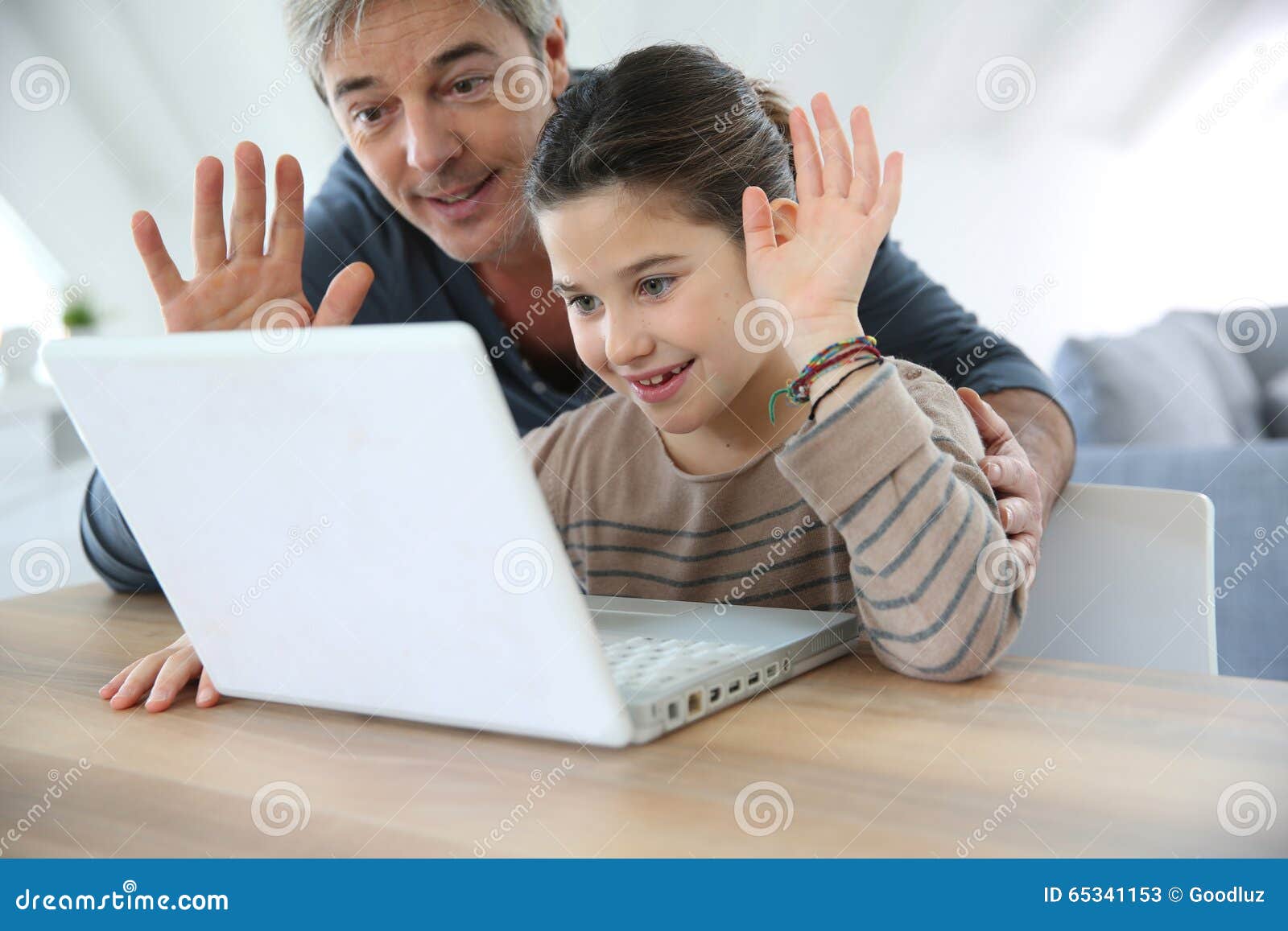 Father and Daughter Making Video Call on Internet Stock Image - Image ...