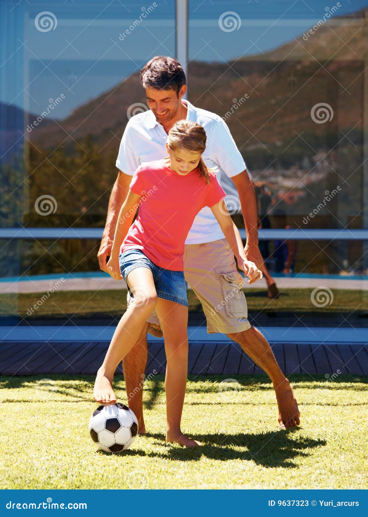 Father and Daughter Playing a Game of Soccer Stock Image - Image of ...
