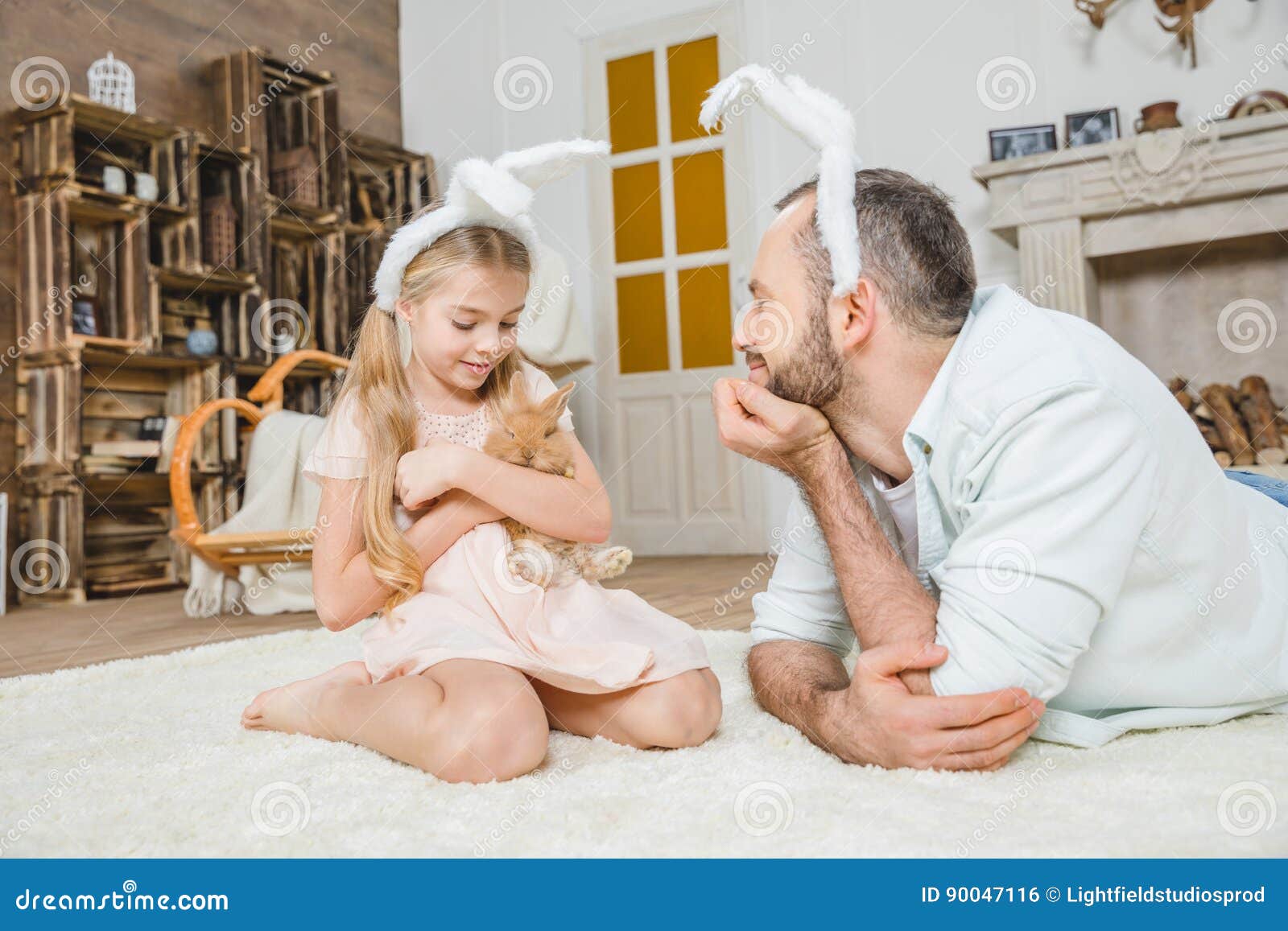 Father and Daughter Playing with Rabbit Stock Photo - Image of daddy ...