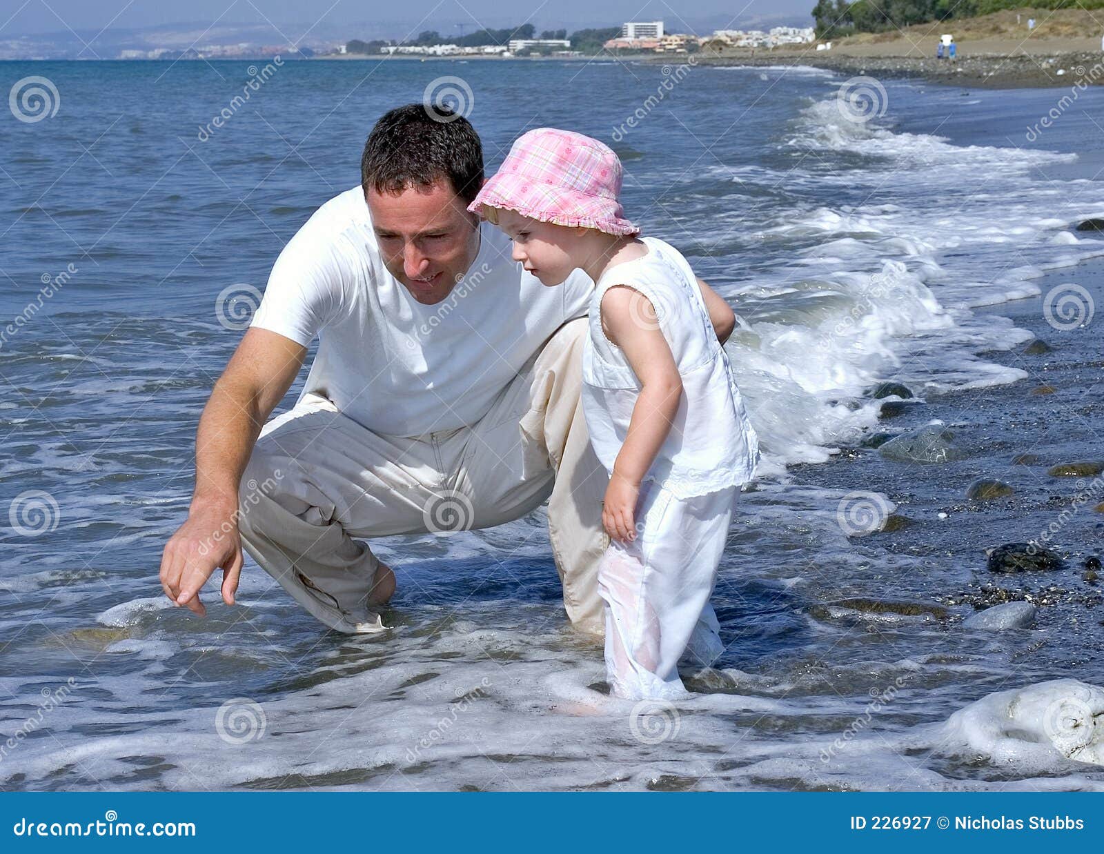 Father and Daughter Playing in the Sea Stock Image - Image of father ...