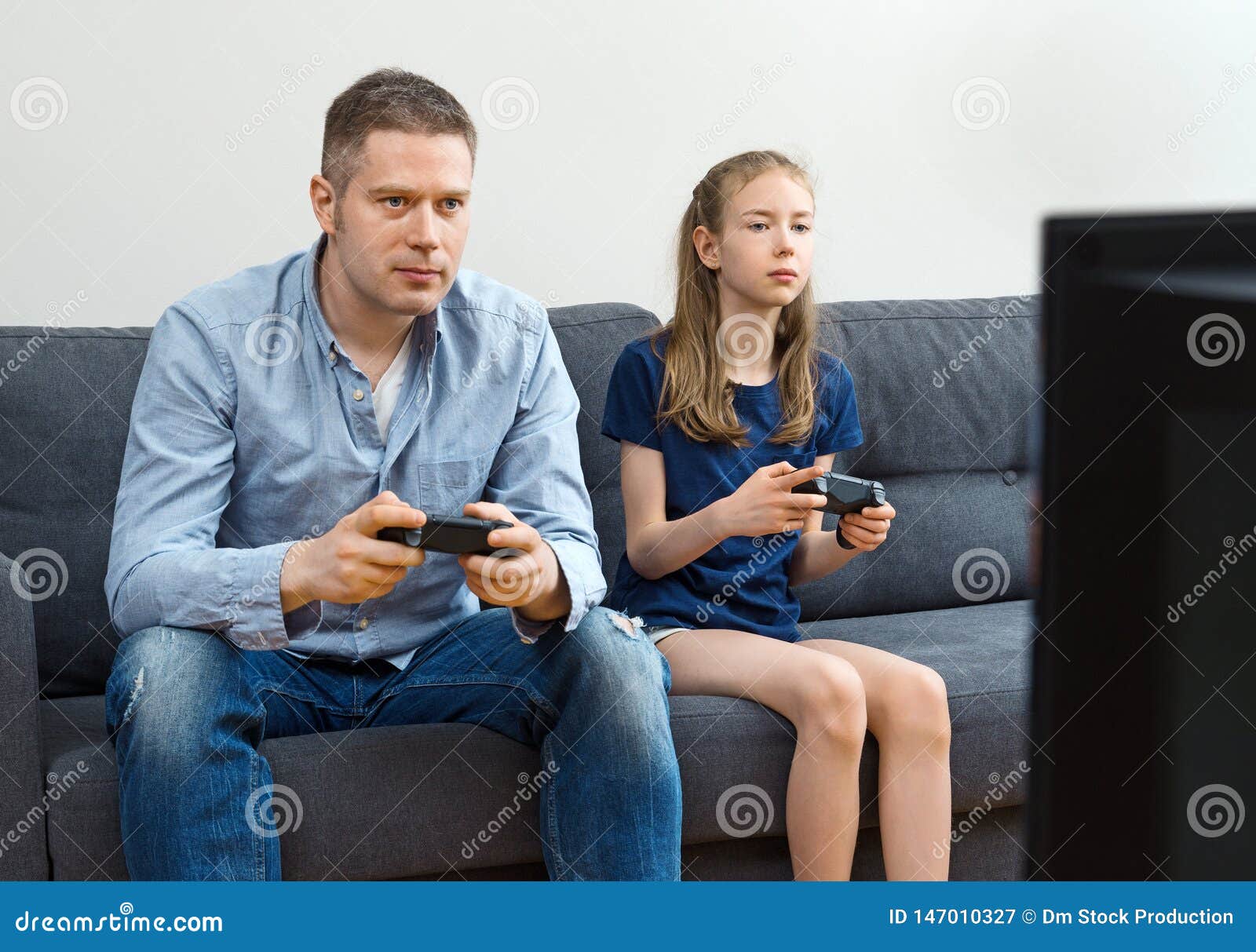 Father and Daughter Playing Video Game. Stock Image - Image of game ...
