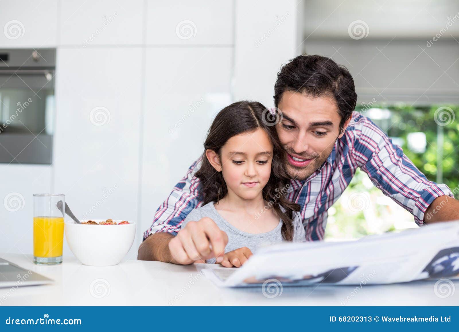Father and Daughter Reading Newspaper at Home Stock Image - Image of ...