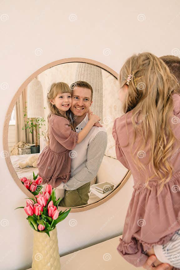 Happy Father with Daughter Reflection in the Mirror Stock Photo - Image ...