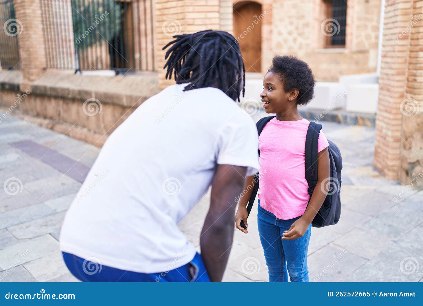 Father and Daughter Standing Together Speaking at School Stock Image ...