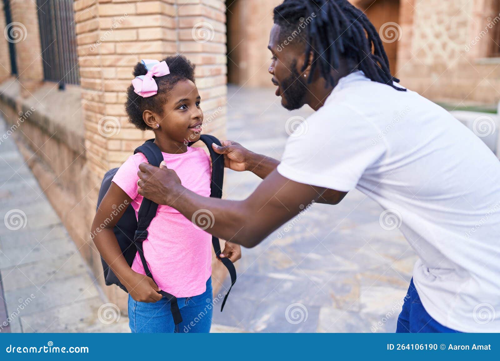 Father and Daughter Standing Together Speaking at School Stock Photo ...