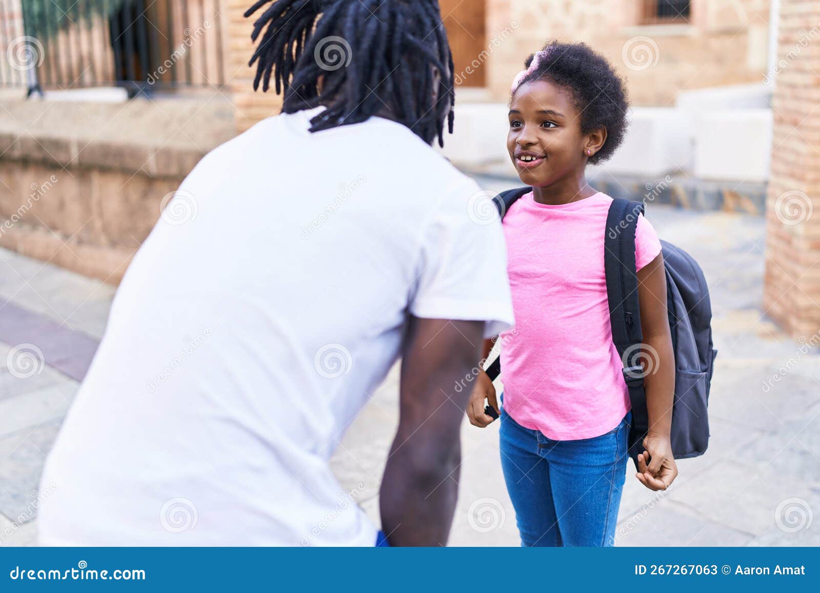 Father and Daughter Standing Together Speaking at School Stock Image ...