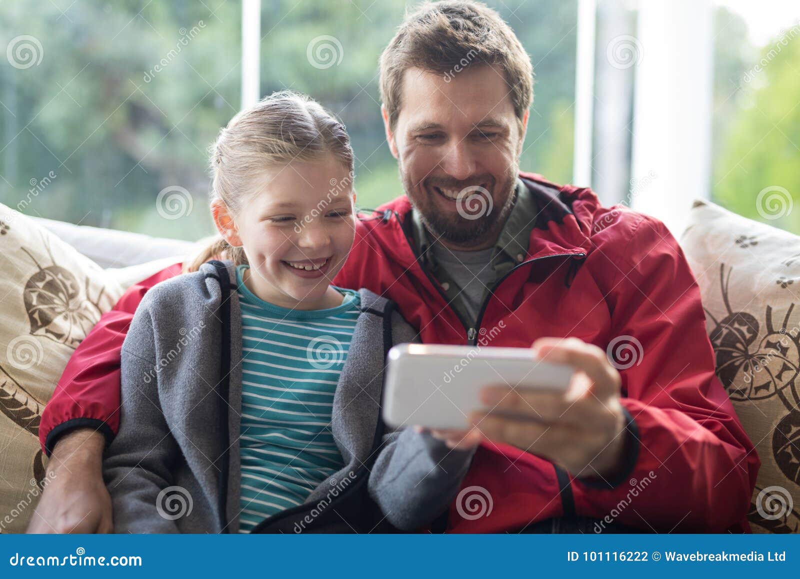 Father and Daughter Using Mobilephone Stock Photo - Image of bonding ...