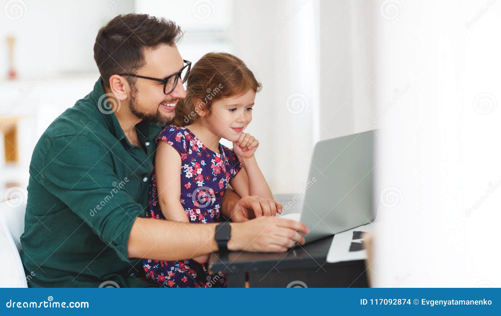 Father and Daughter Working at a Computer at Home Stock Photo - Image ...
