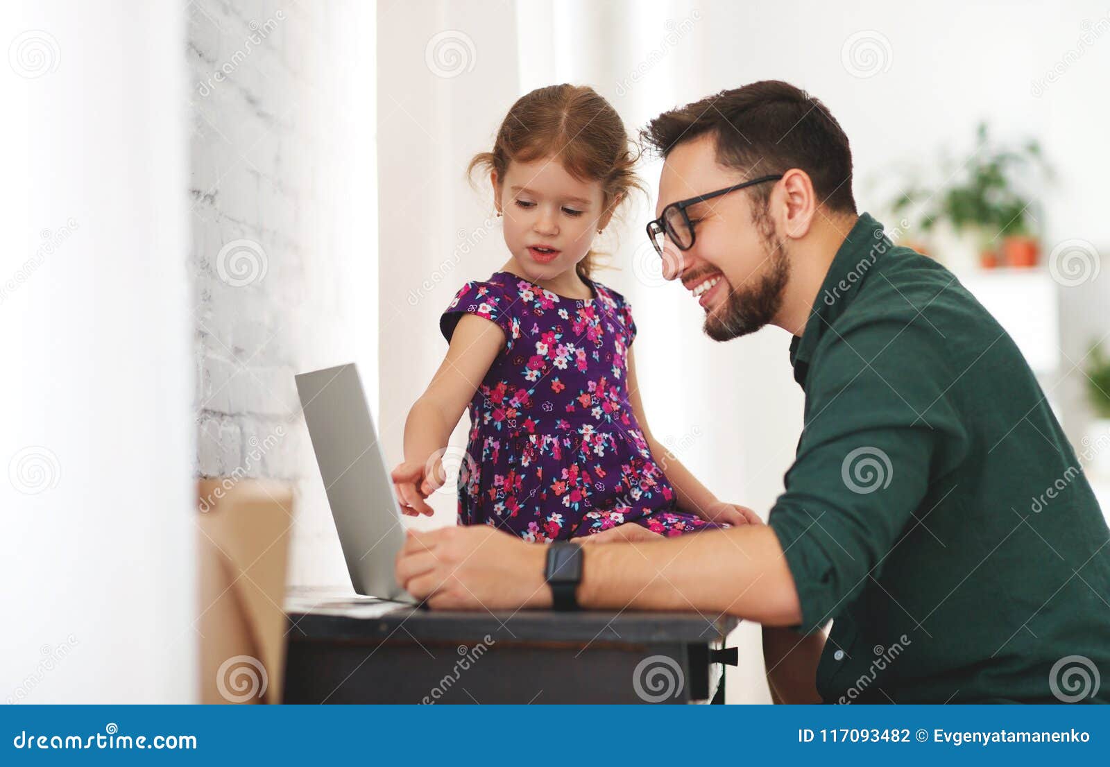 Father and Daughter Working at a Computer at Home Stock Photo - Image ...