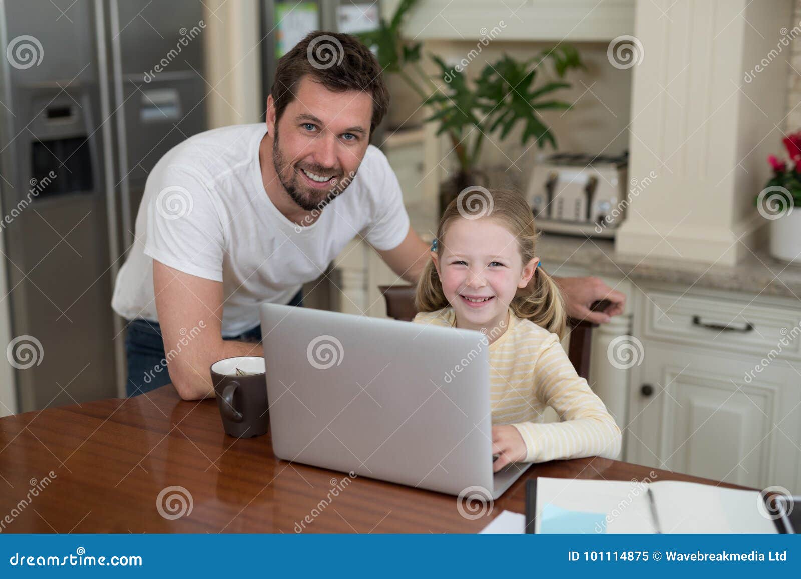 Father and Daughter Working on Laptop at Home Stock Image - Image of ...