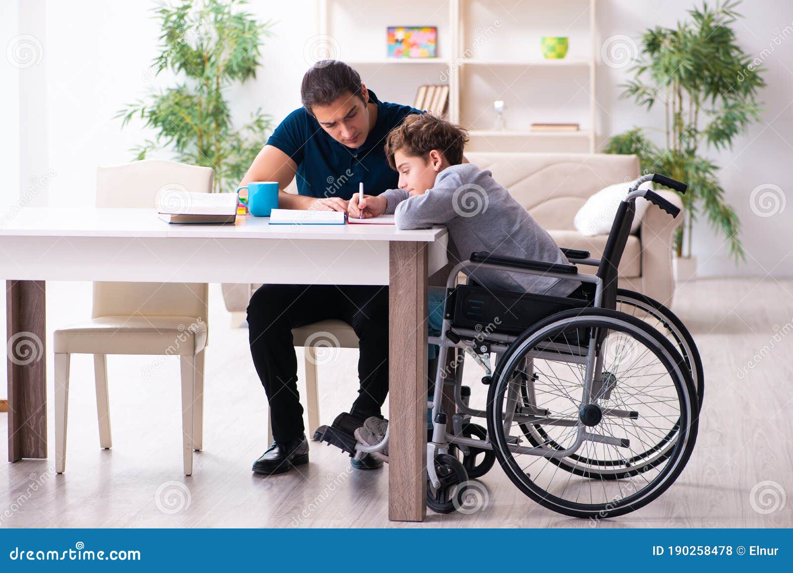Father and Disabled Son in Education Concept Stock Photo - Image of ...