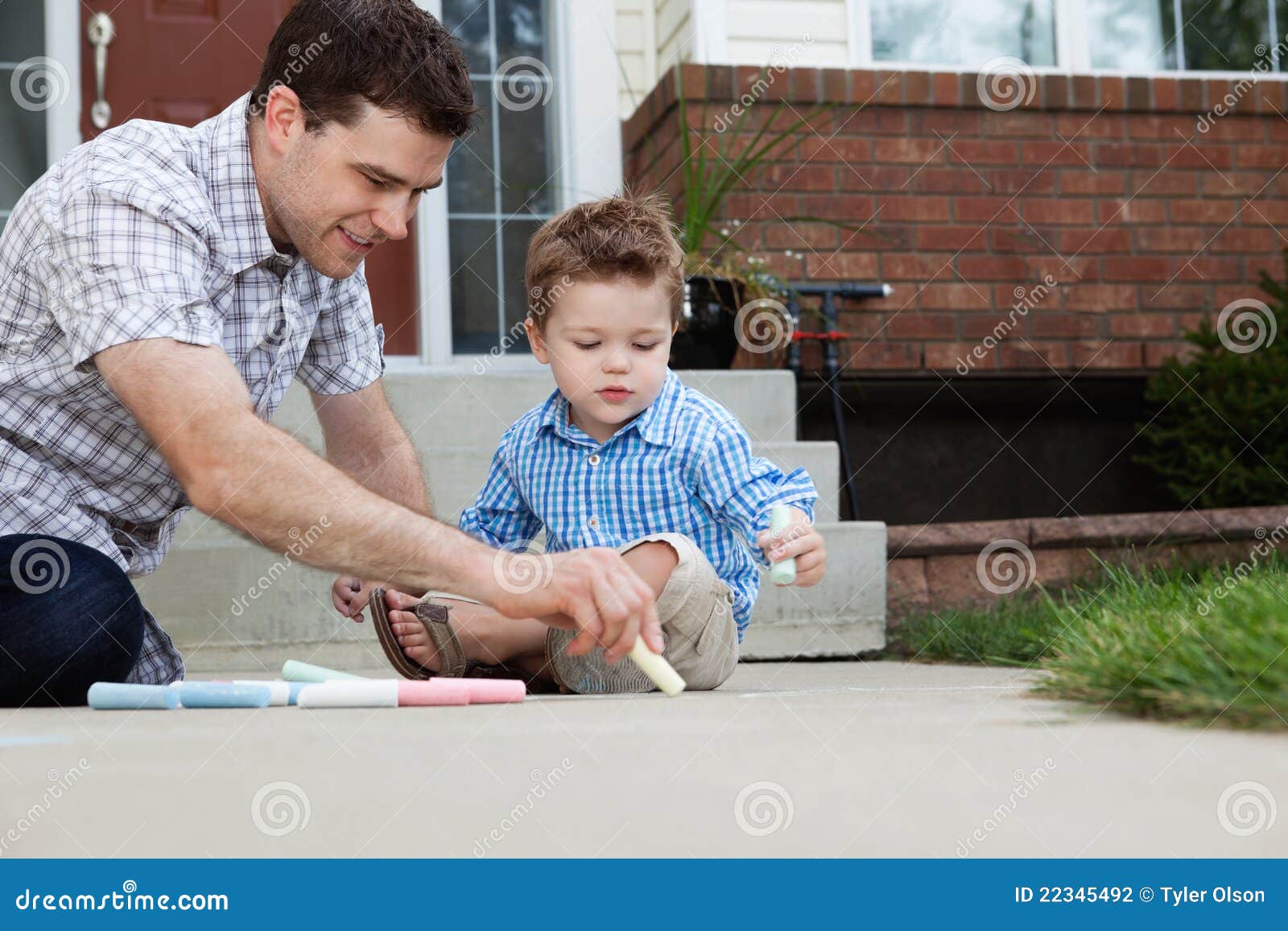 Father Drawing with Chalk on Ground Stock Photo - Image of casual, cute ...