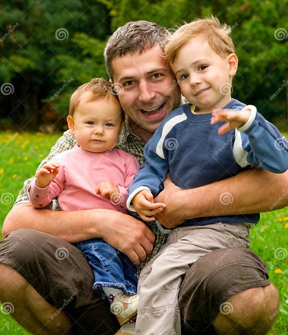 Father embracing children stock photo. Image of love, parental - 6219552