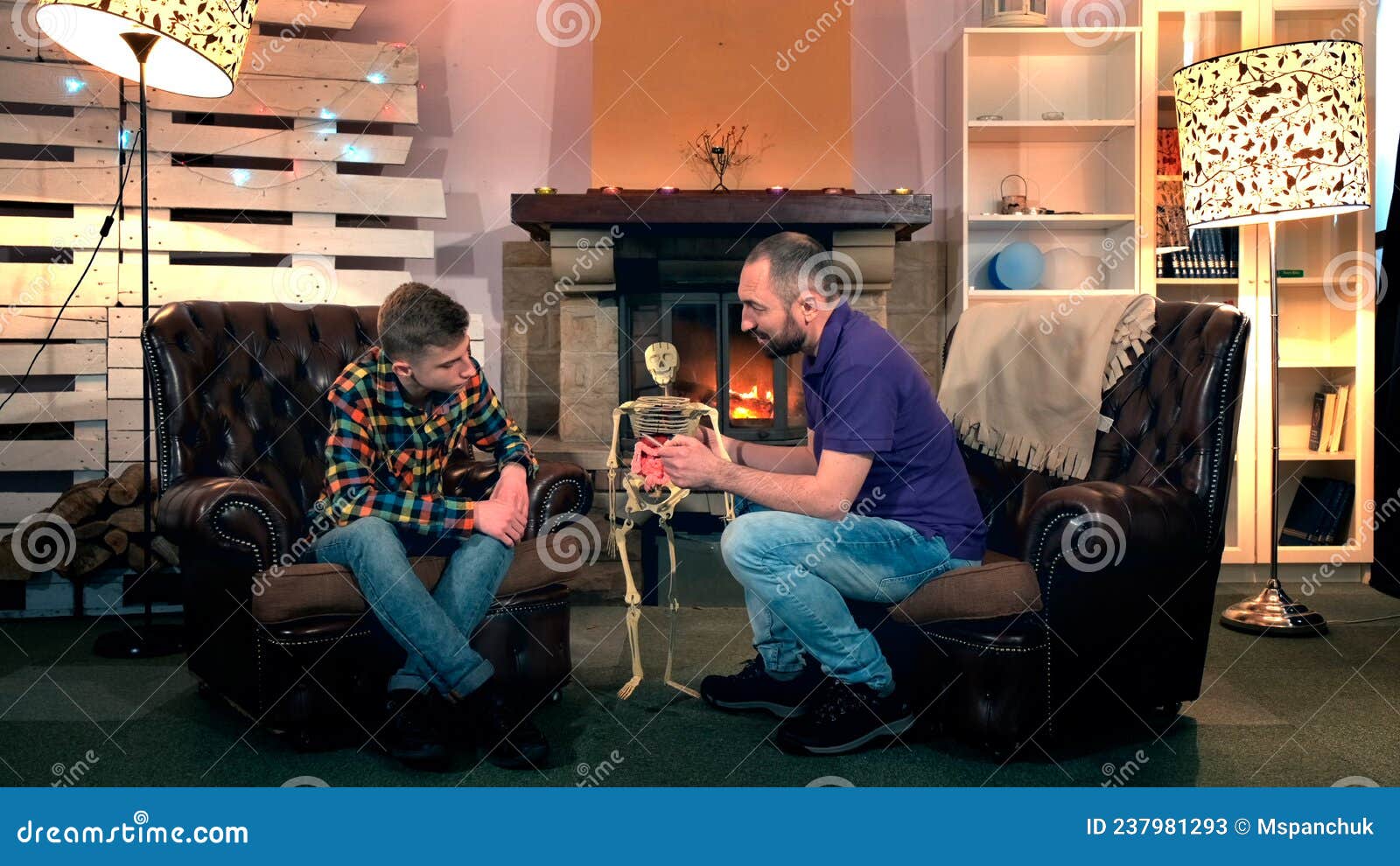 Father Explaining His Elder Son the Bone Structure of Human Body ...