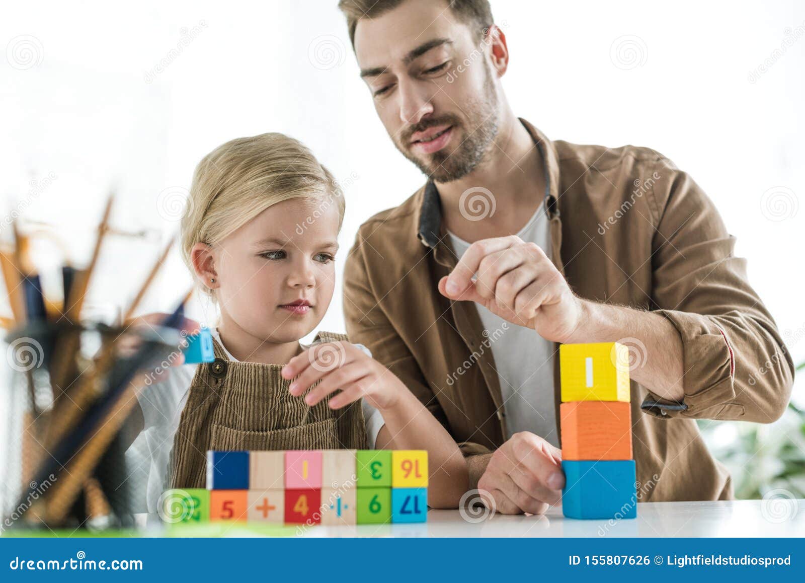 Father Explaining Math To Little Daughter and Playing with Colorful ...