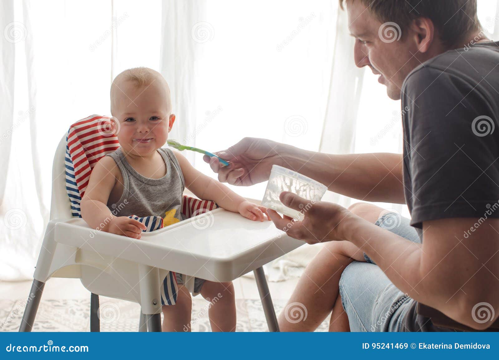 Father Feeding Cute Baby at Home Stock Image - Image of dream, carefree ...