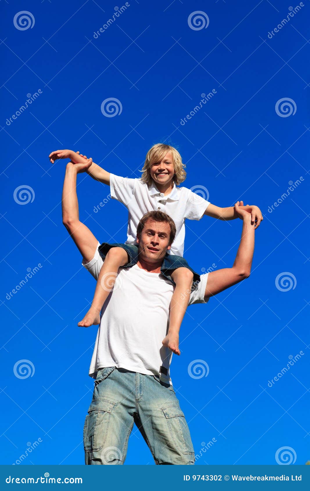 Father Giving His Son a Piggyback Ride Stock Photo - Image of camera ...