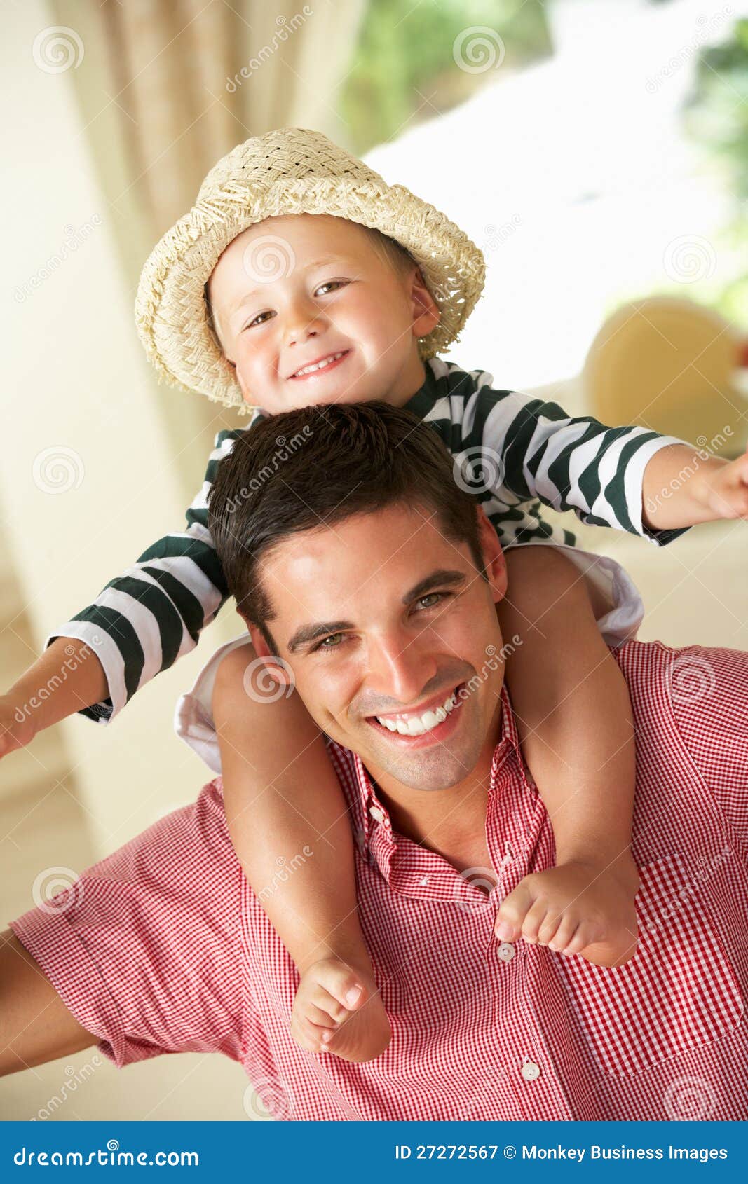 Father Giving Son Ride on Shoulders Indoors Stock Image - Image of ...