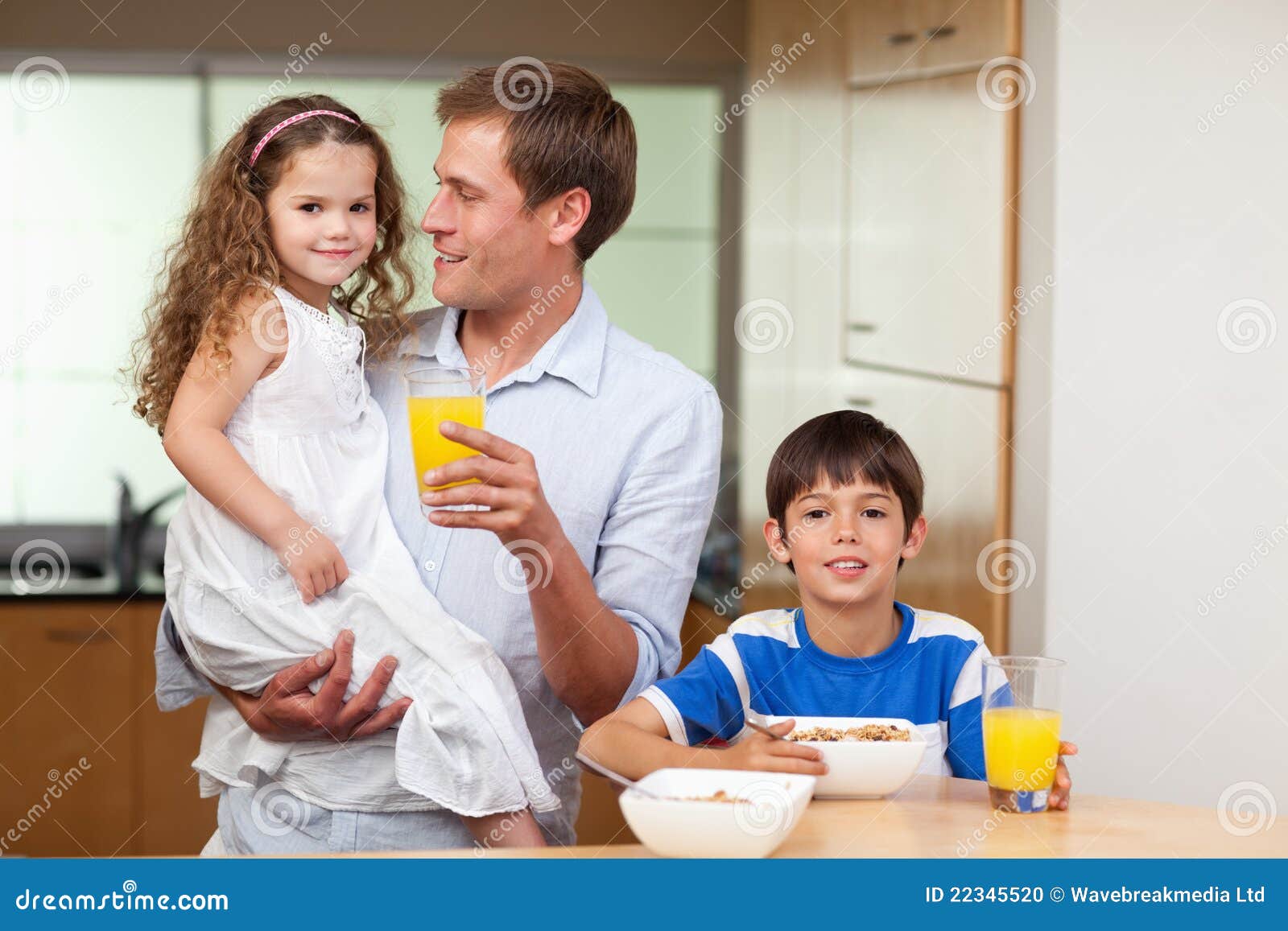 Father Having Breakfast with His Kids Stock Photo - Image of meal ...