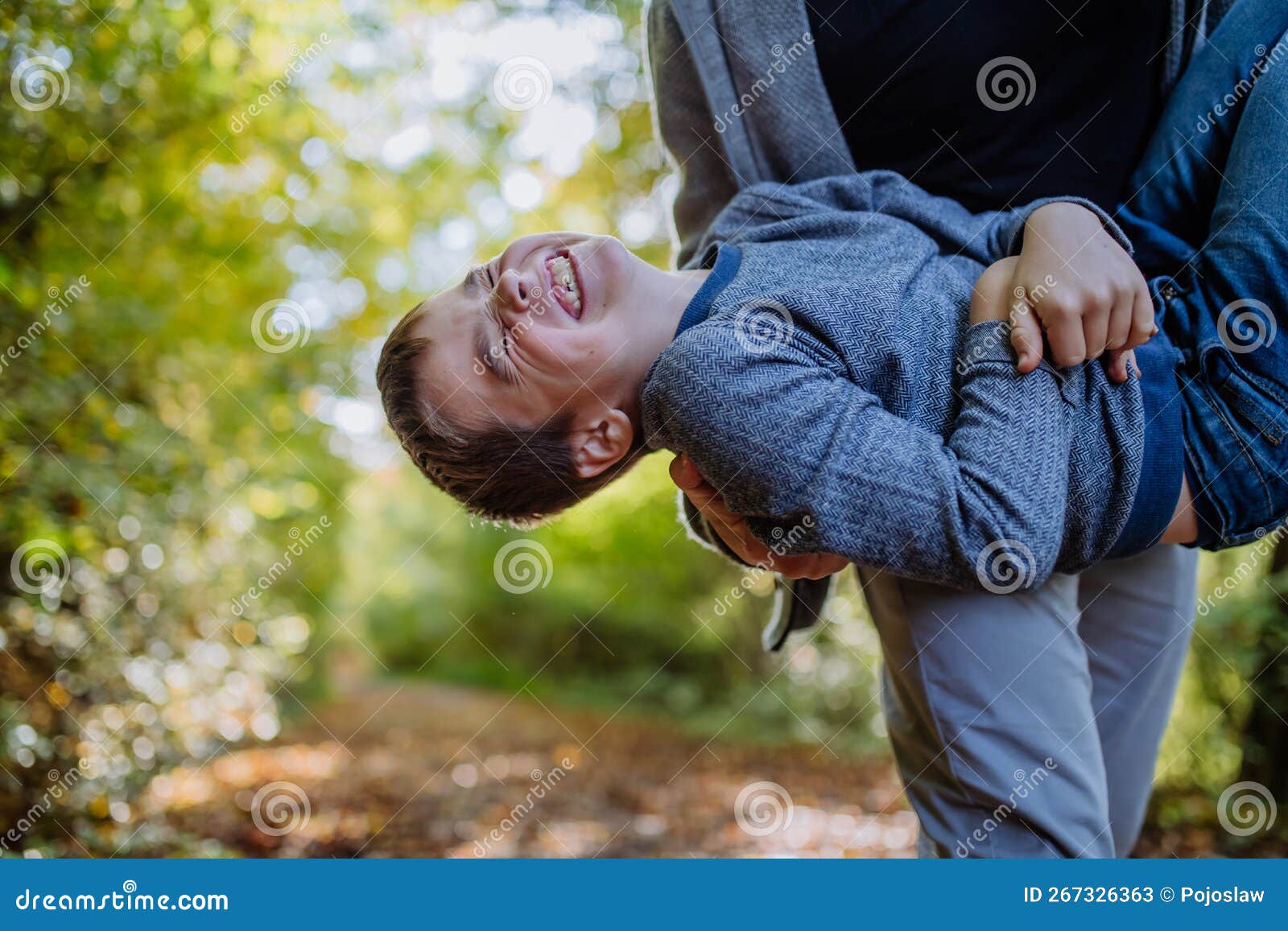 Father Having Fun with His Son in Forest. Stock Image - Image of ...