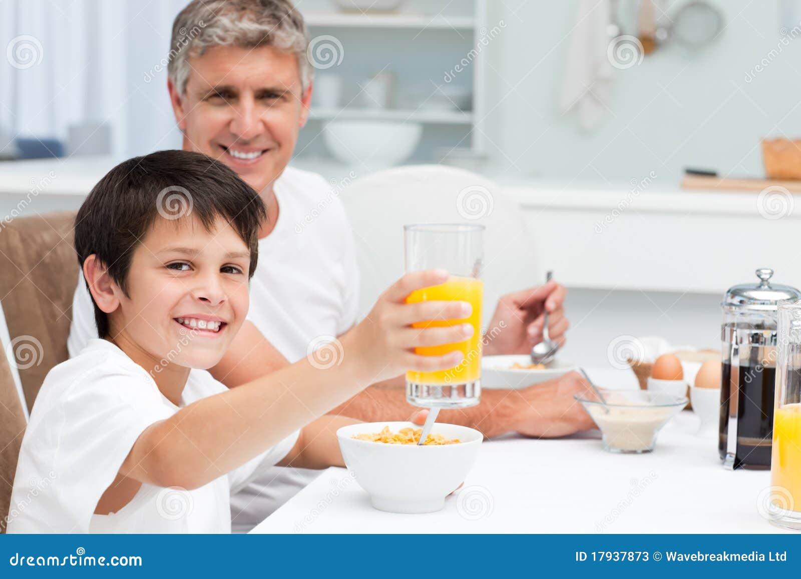 Father Having His Breakfast with His Son Stock Image - Image of home ...