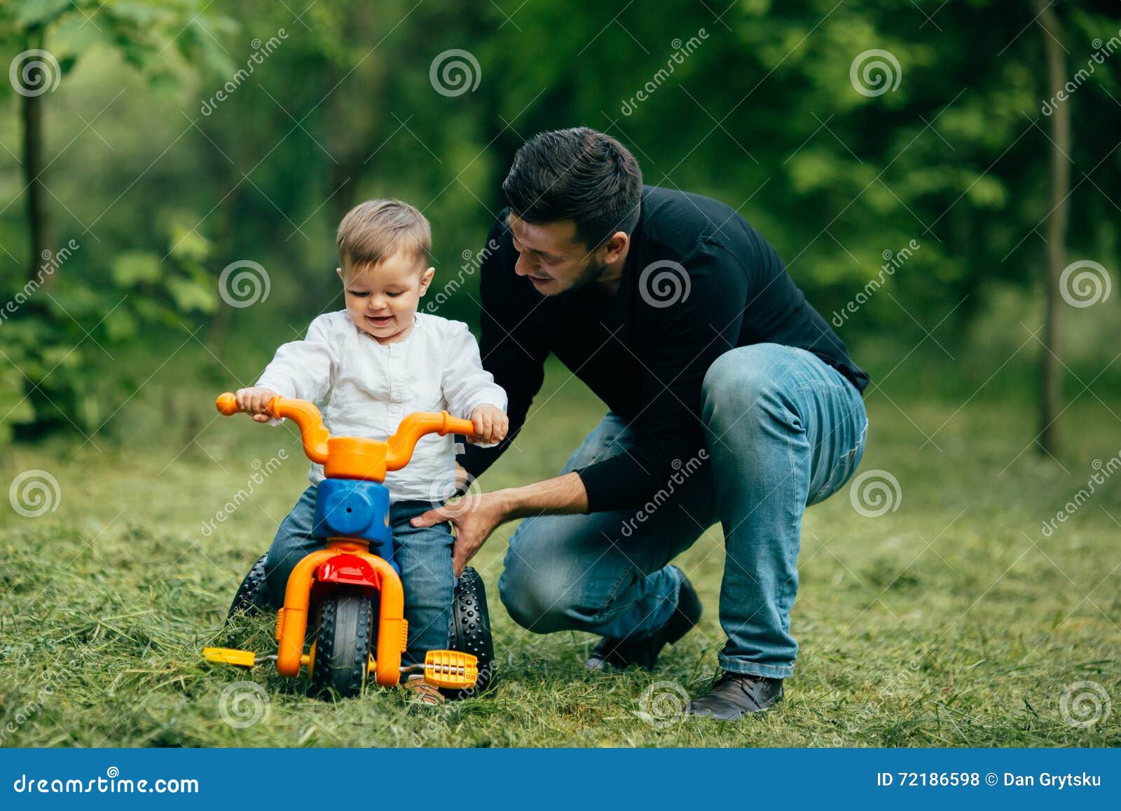 Father Help His Child To Ride Stock Photo - Image of bike, fast: 72186598