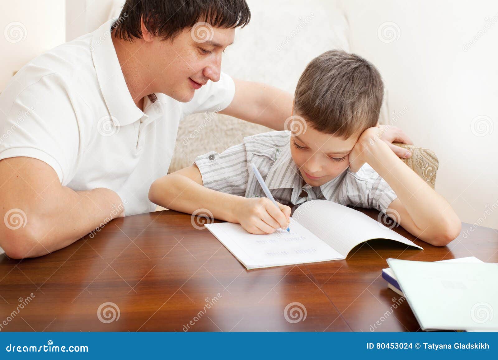 Father Helping Boy Do Homework Stock Photo - Image of classroom ...