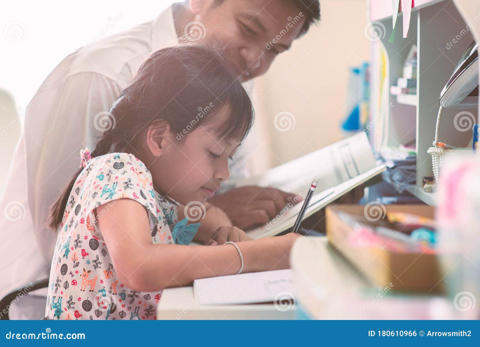 Father Helping Her Daughter for Her Homework with Funny Stock Photo ...